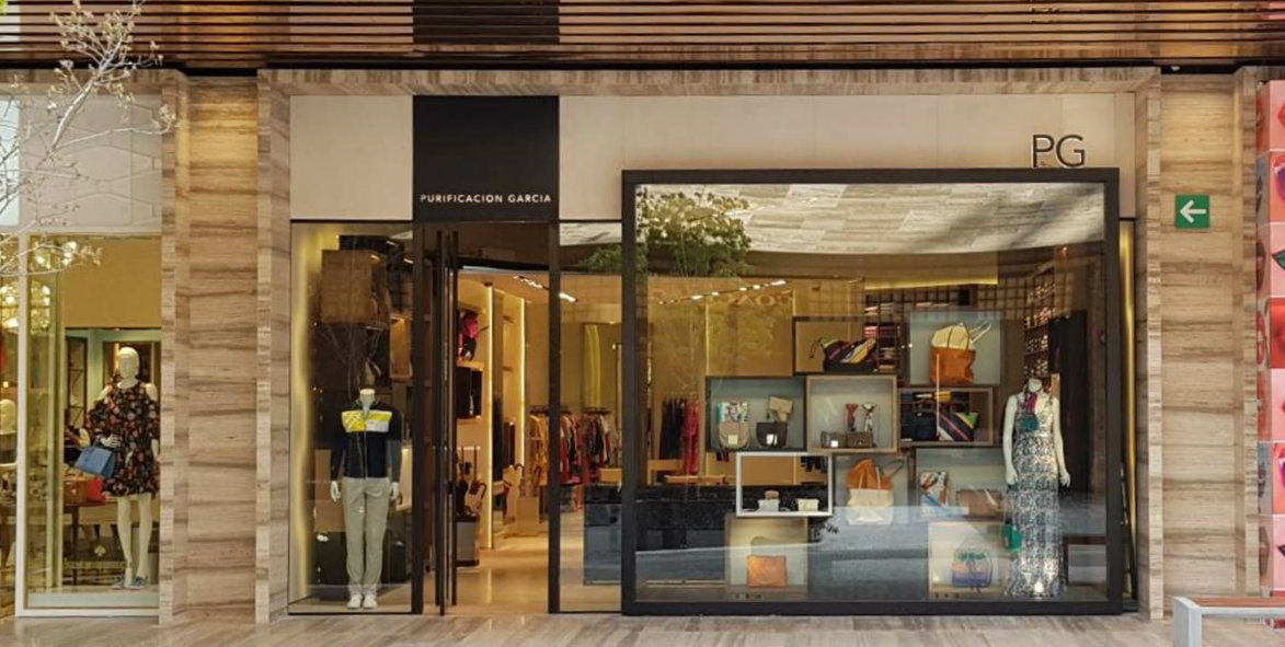 PURIFICACIÓN GARCÍA: LA EMPRESA - Enrique Ortega Burgos